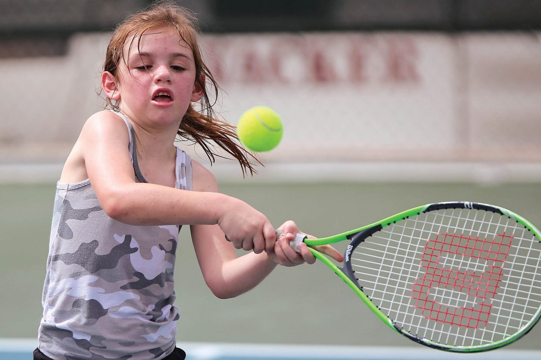 Working on her backhand - Cape Coral Breeze